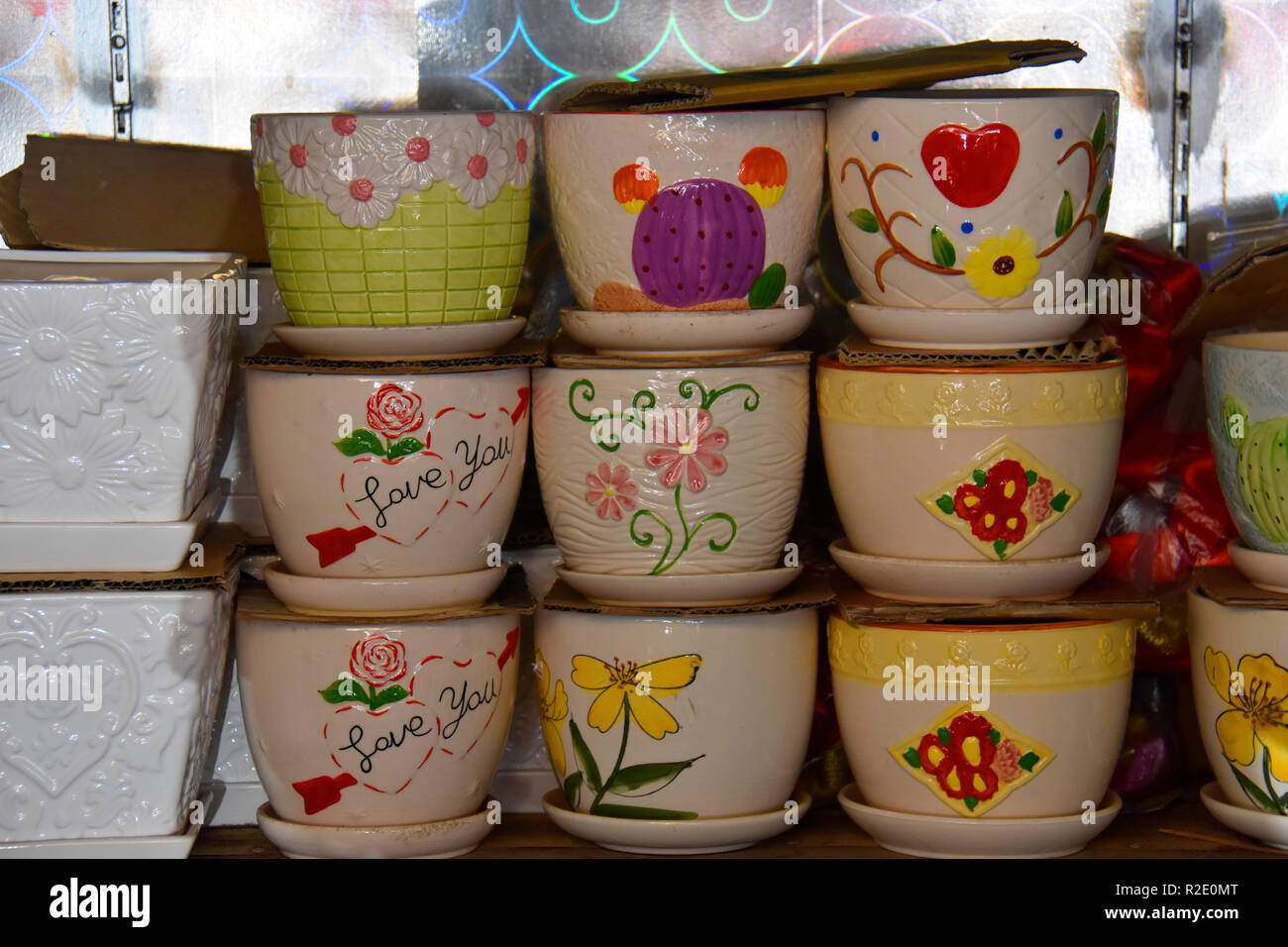 Colourful everyday objects on display and for sale on a market in Pnom ...