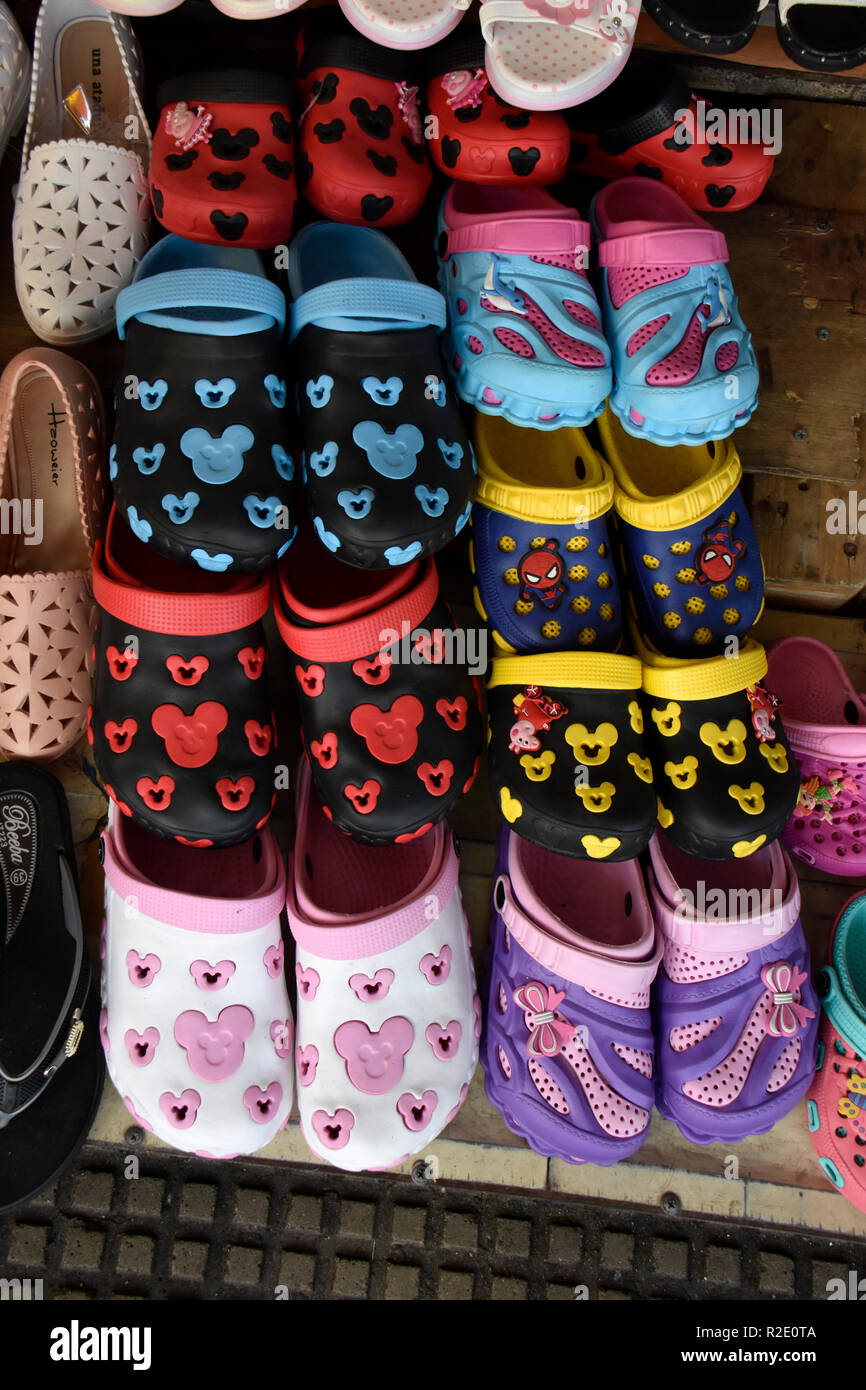 Colourful everyday objects on display and for sale on a market in Pnom ...