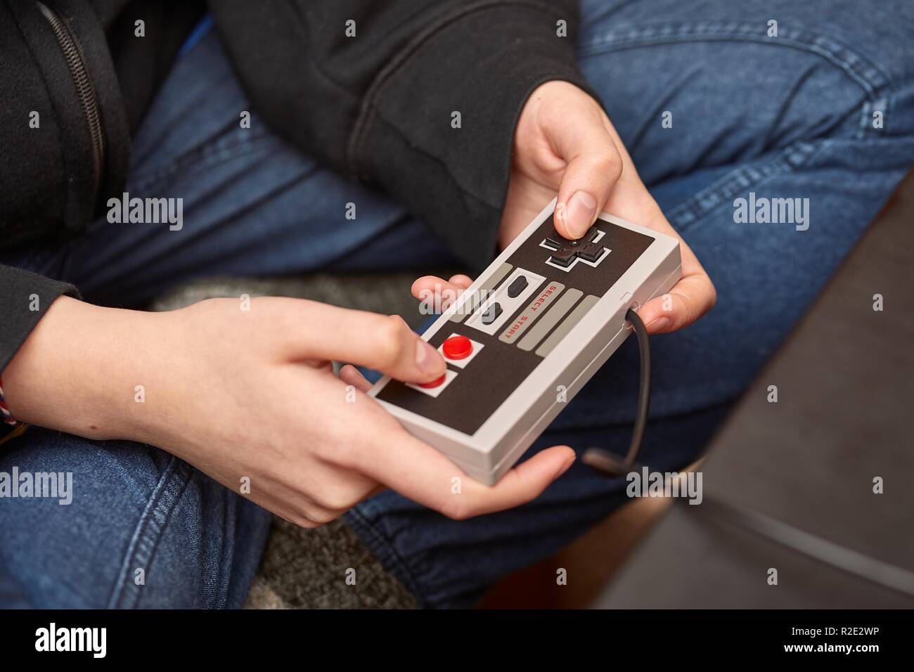 Playing an old gaming console Stock Photo - Alamy