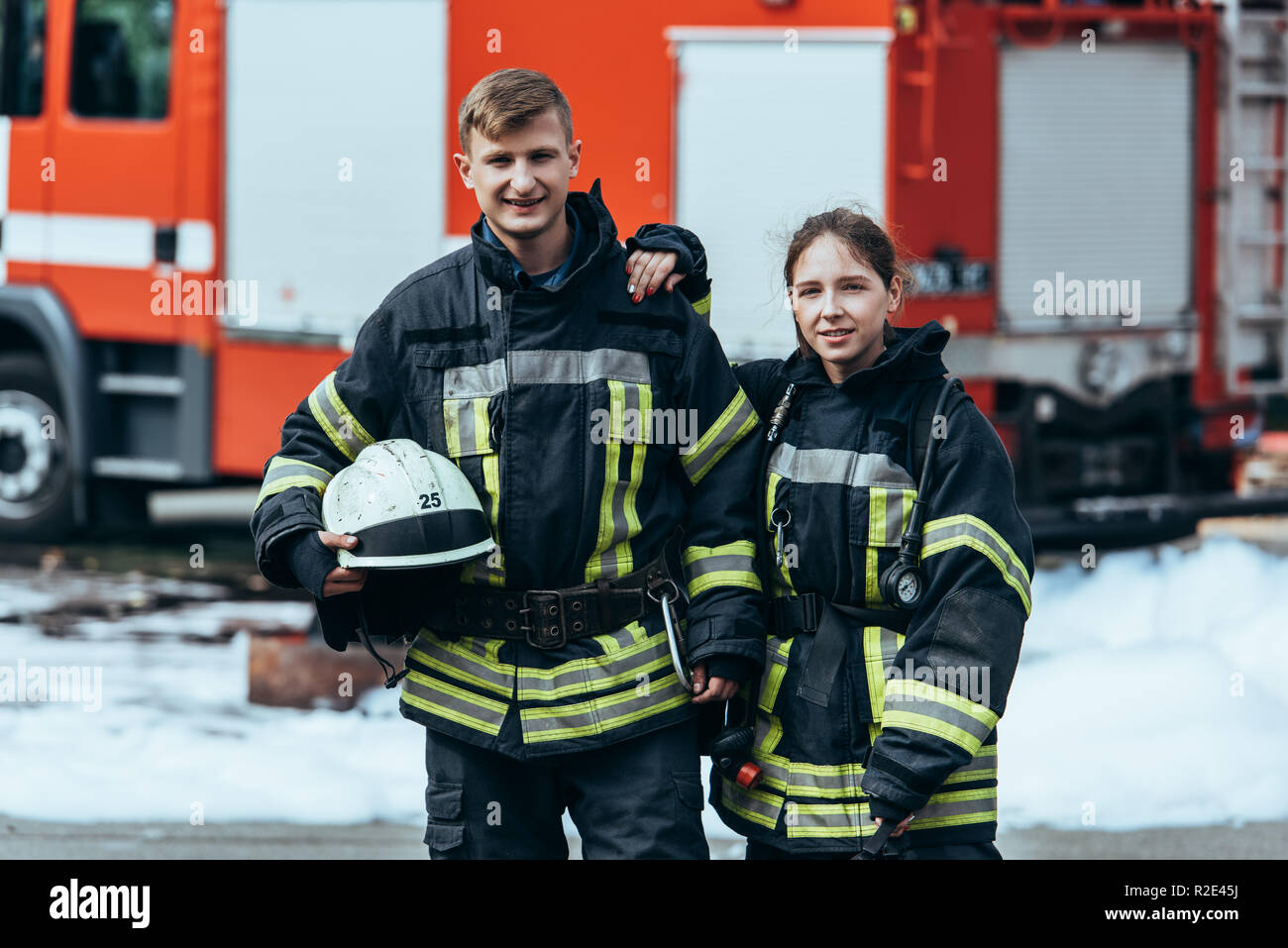 Firefighters standing on street hi-res stock photography and images - Alamy