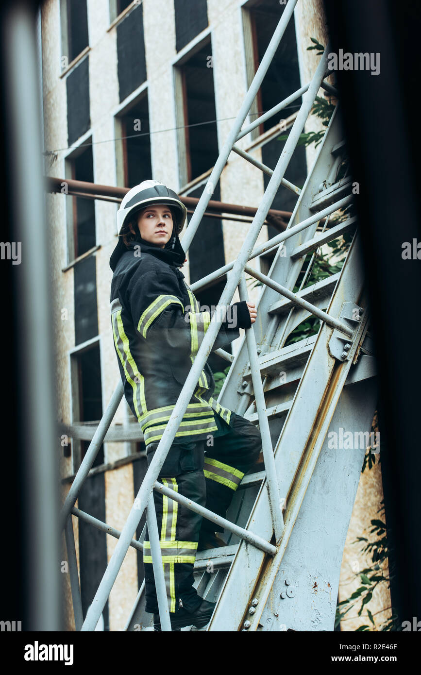 Woman ladder dangerous hi-res stock photography and images - Alamy