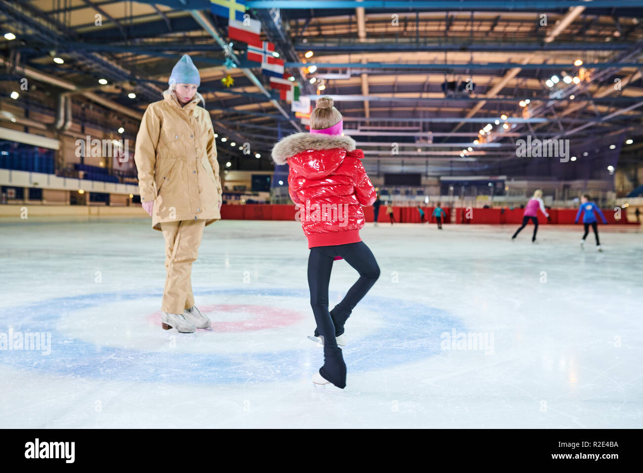 Girl Ice-Skating Back View Stock Photo - Alamy