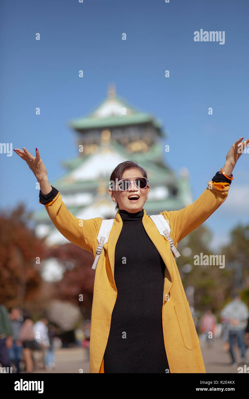 asian traveling woman happiness emotion in front of osaka castle one of ...