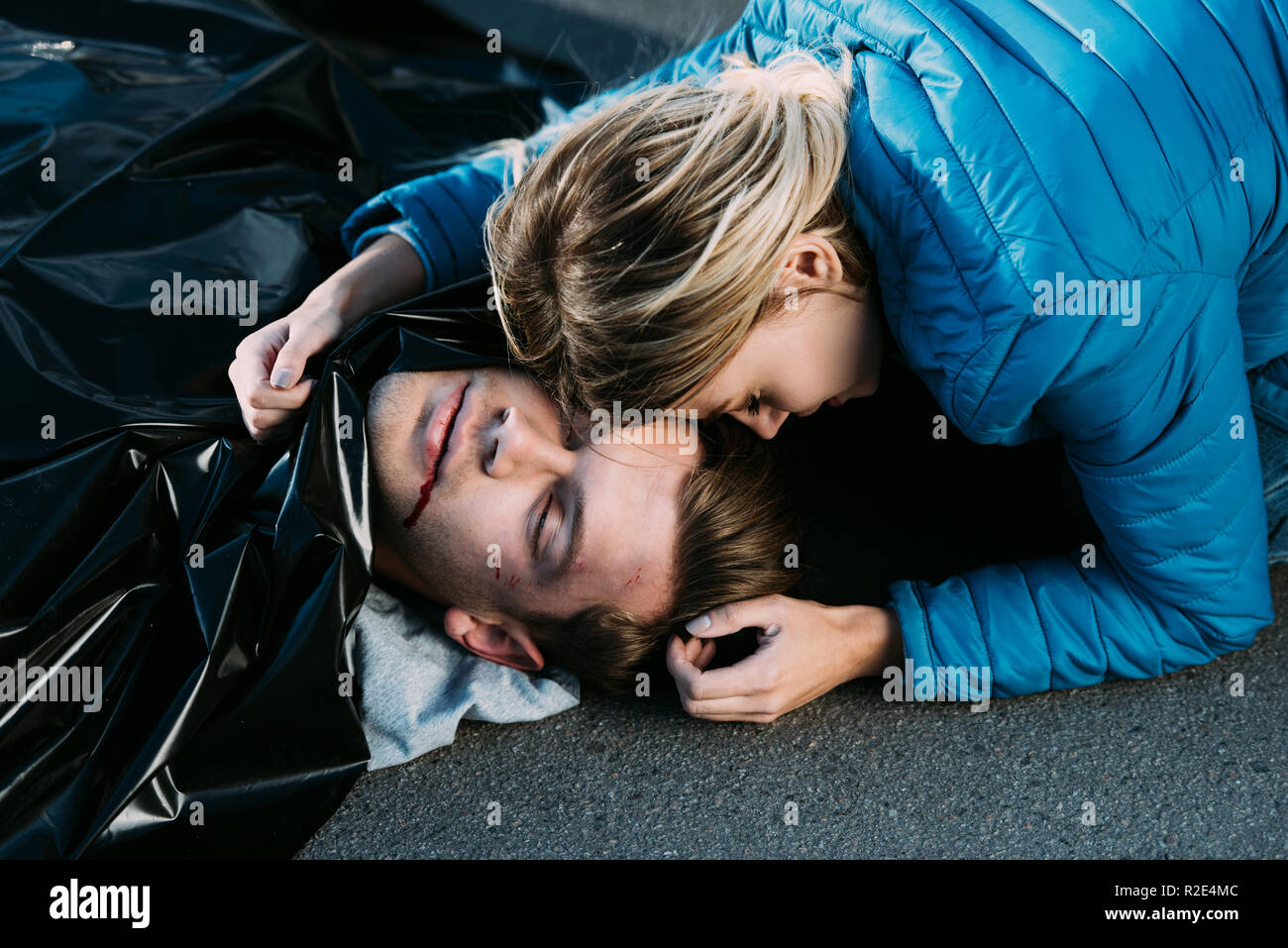 Two People Hugging And Crying