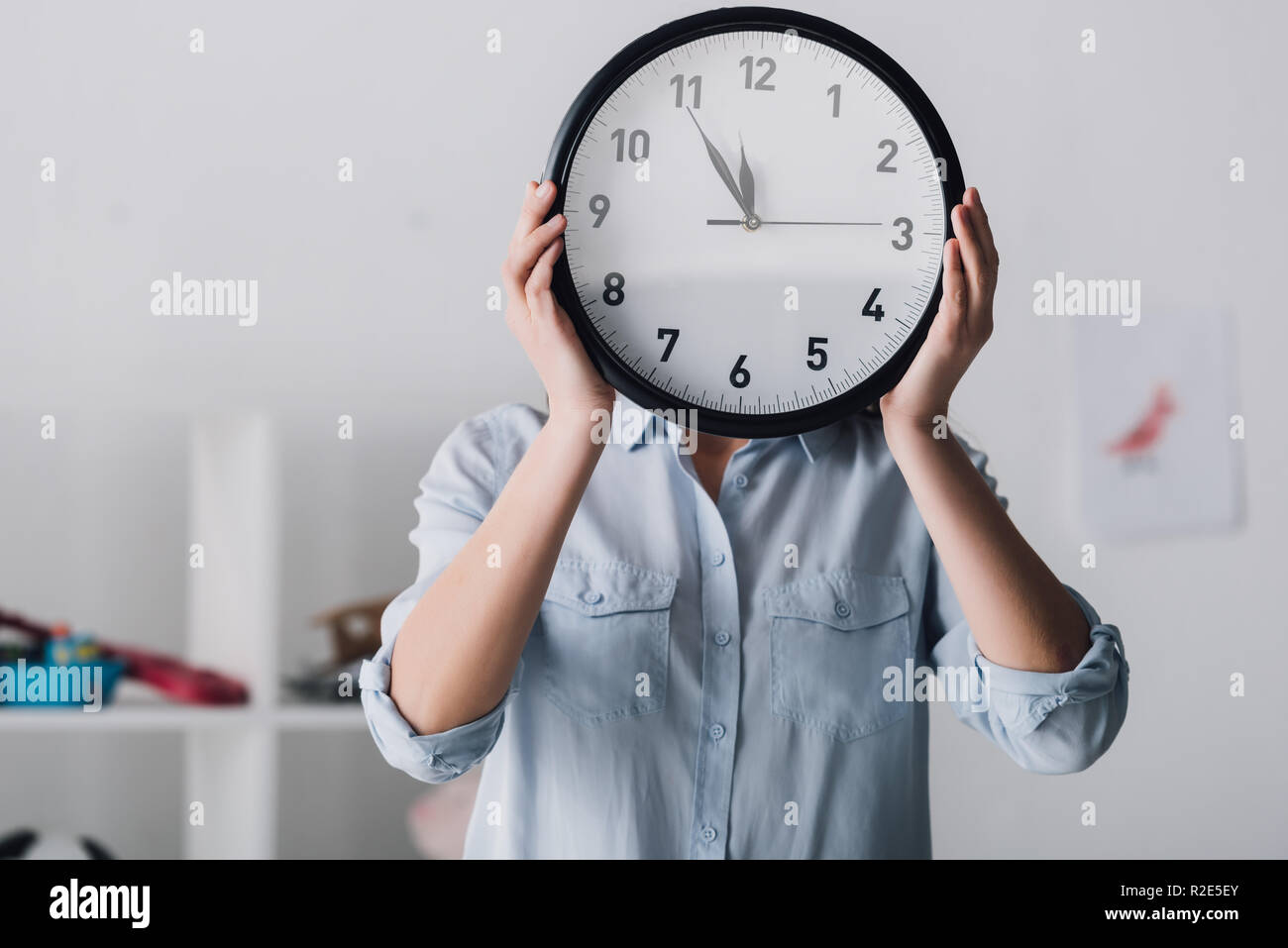 Woman face clock not alarm hi-res stock photography and images - Alamy