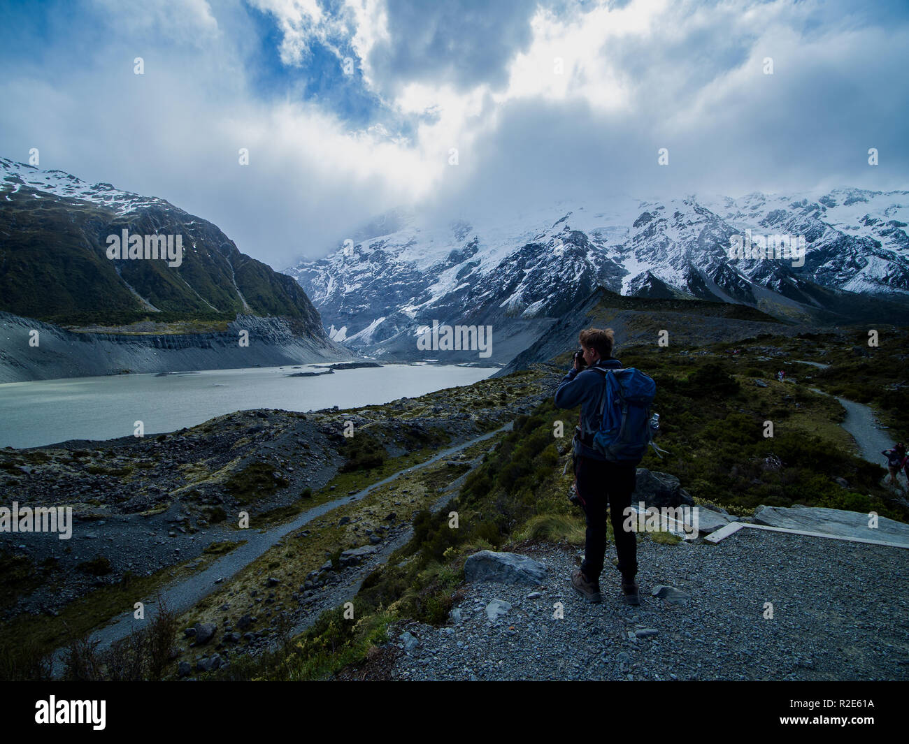 Majestic views of snow capped mountains reflecting on the tranquil lake ...