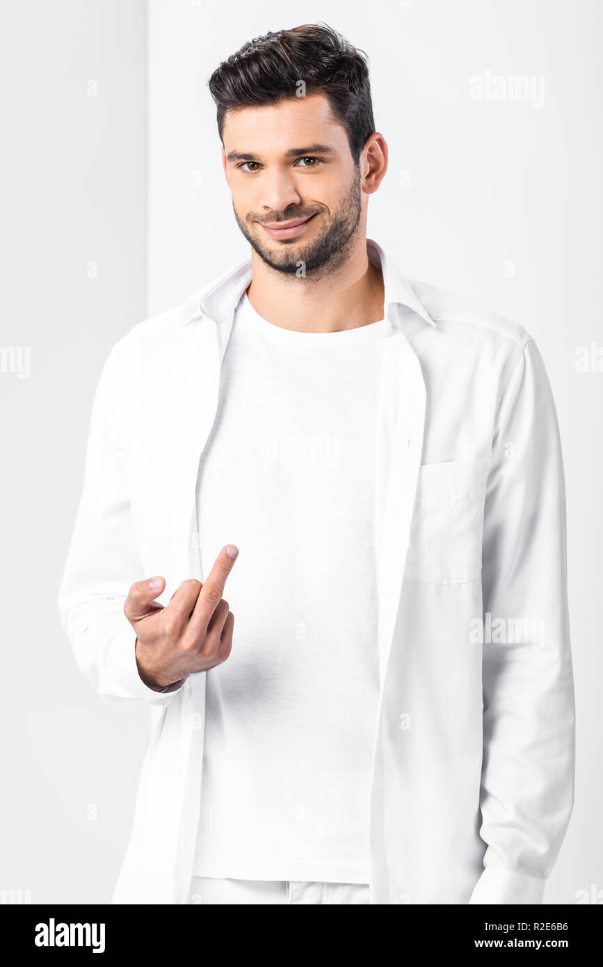 adult handsome man showing middle finger on white background Stock ...