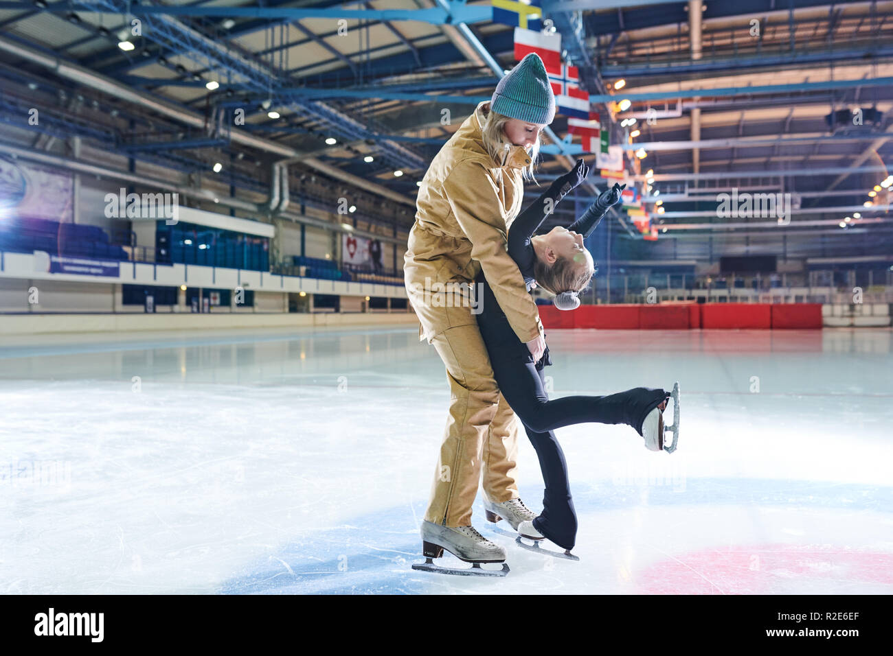 Girl Learning Ice Skating Stock Photo - Alamy