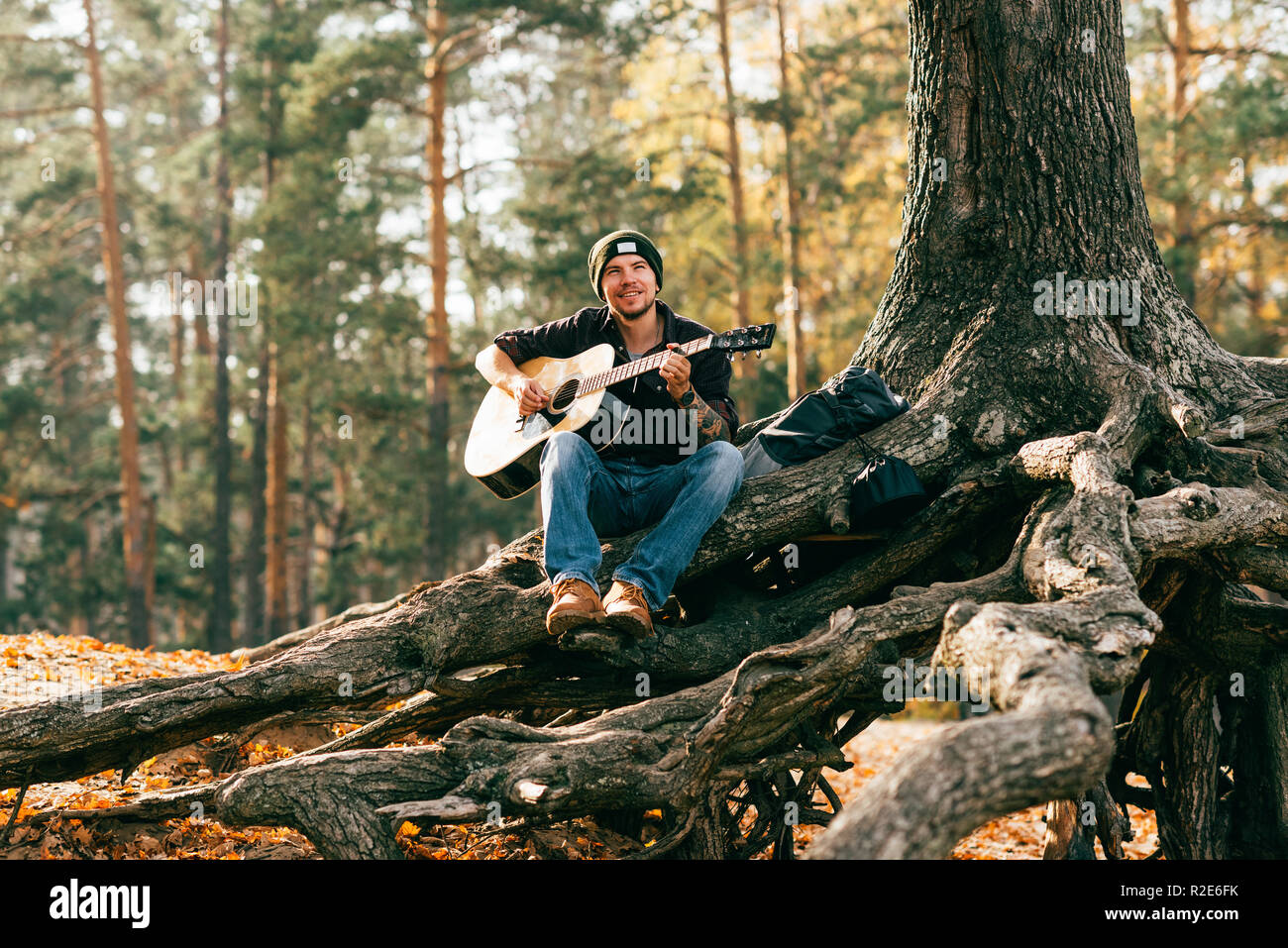 Guitar playing in the woods High Resolution Stock Photography and ...