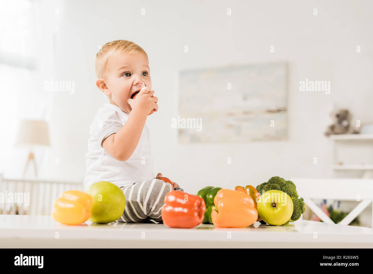 Cute Toddlers Eating Fruit