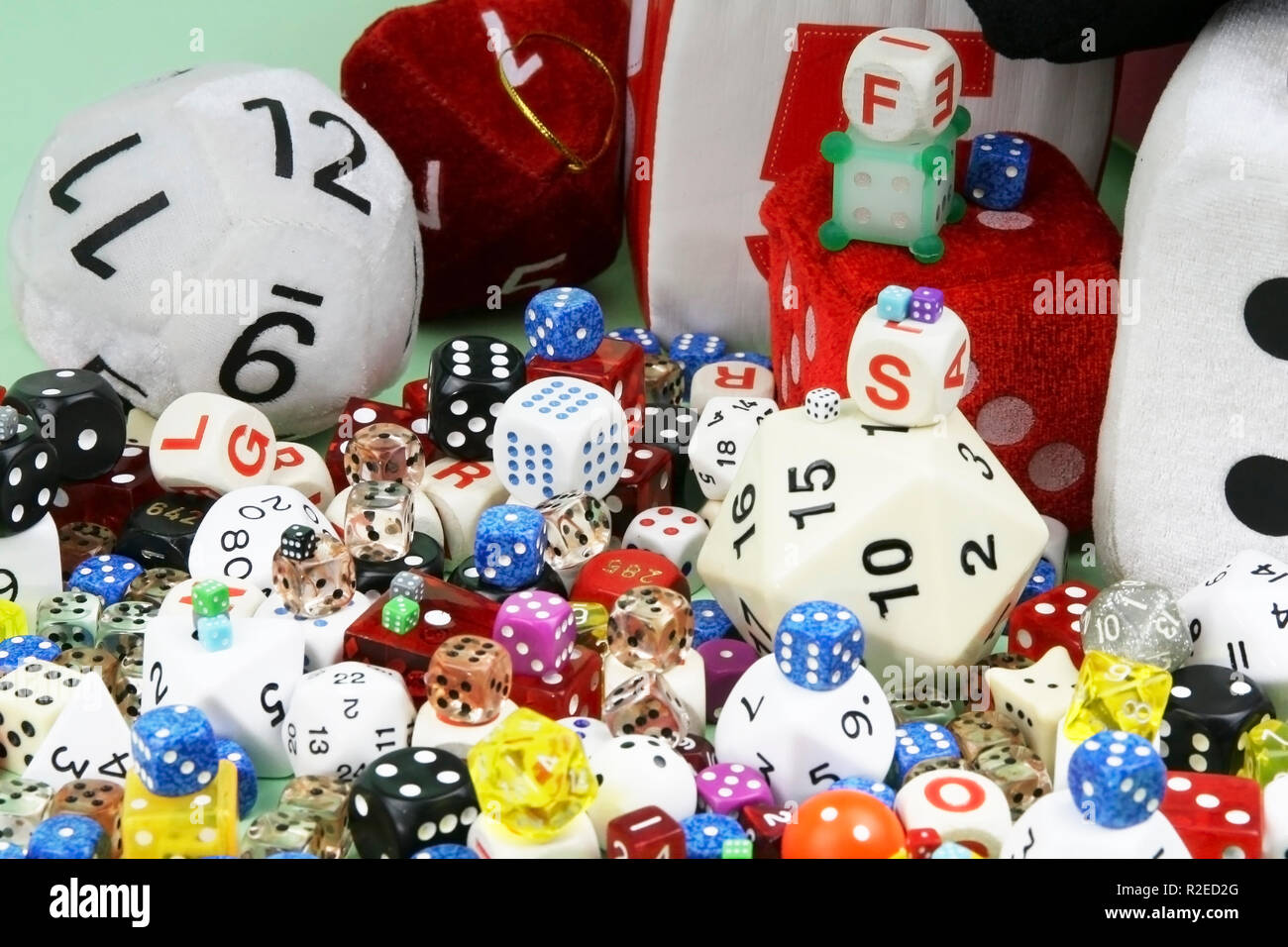 Many kinds of different size and shape dice Stock Photo - Alamy