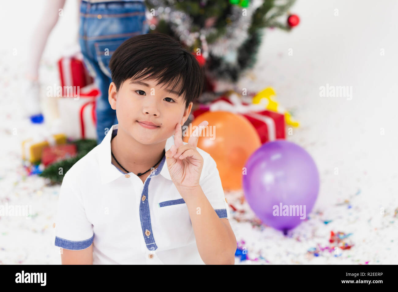 Asian boy smile happy handsome model closeup action in the studio ...