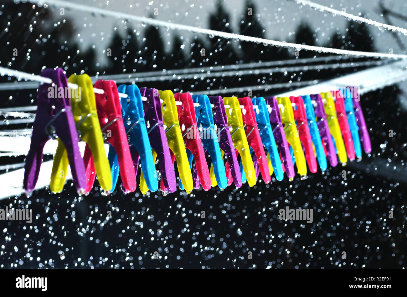 Pegs on washing line hi-res stock photography and images - Alamy