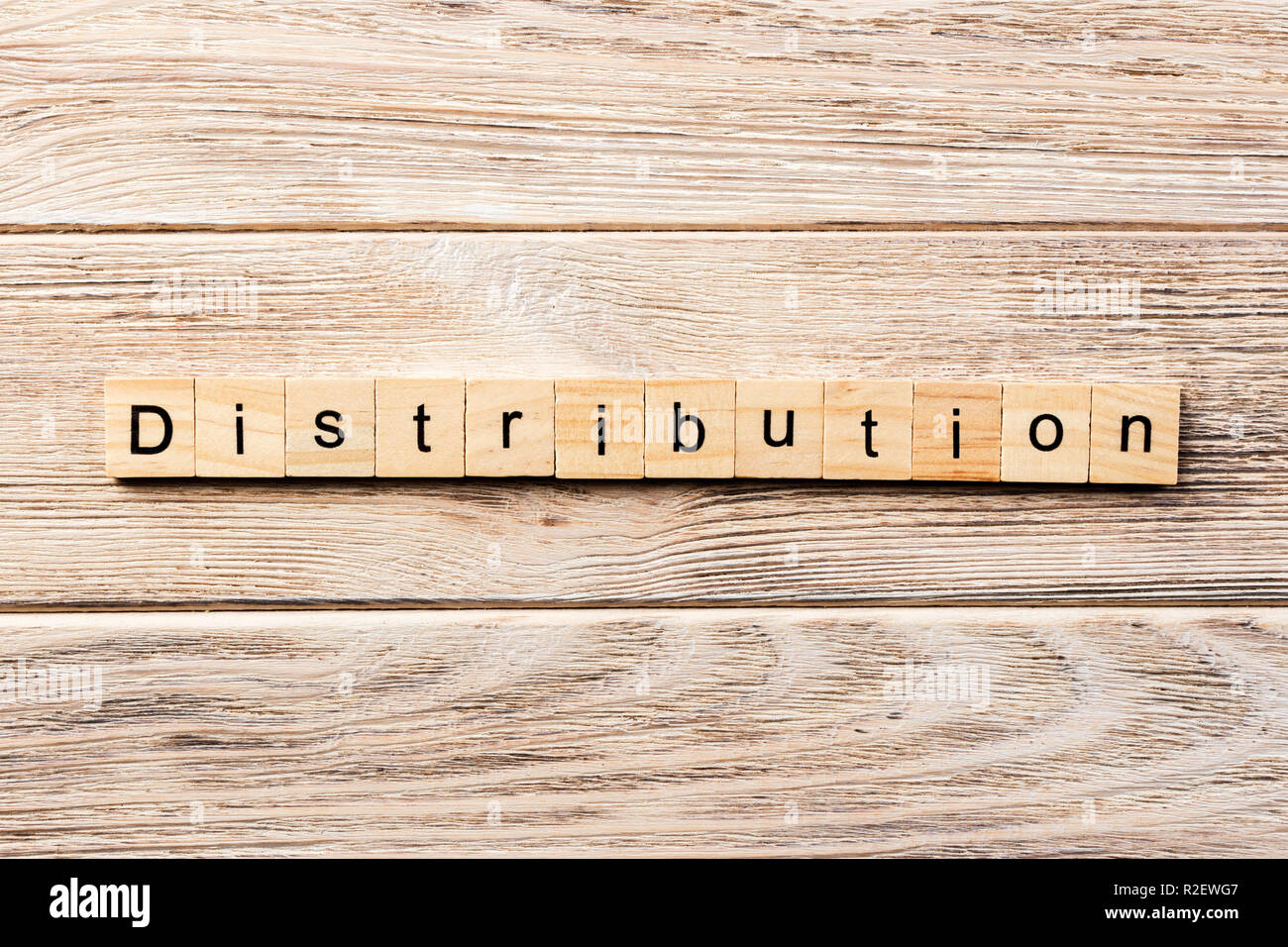 distribution word written on wood block. distribution text on table ...