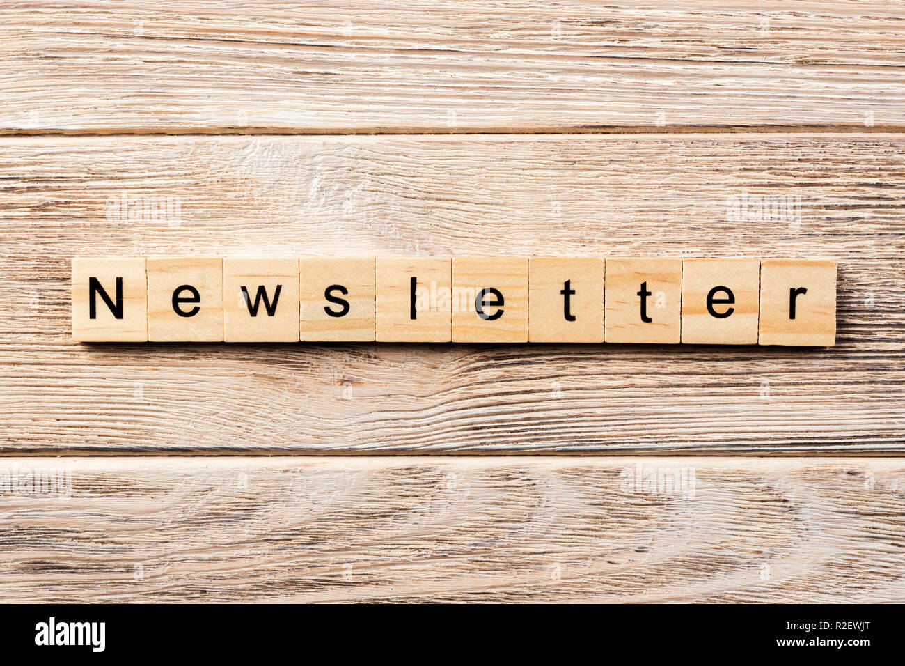 newsletter word written on wood block. newsletter text on table ...