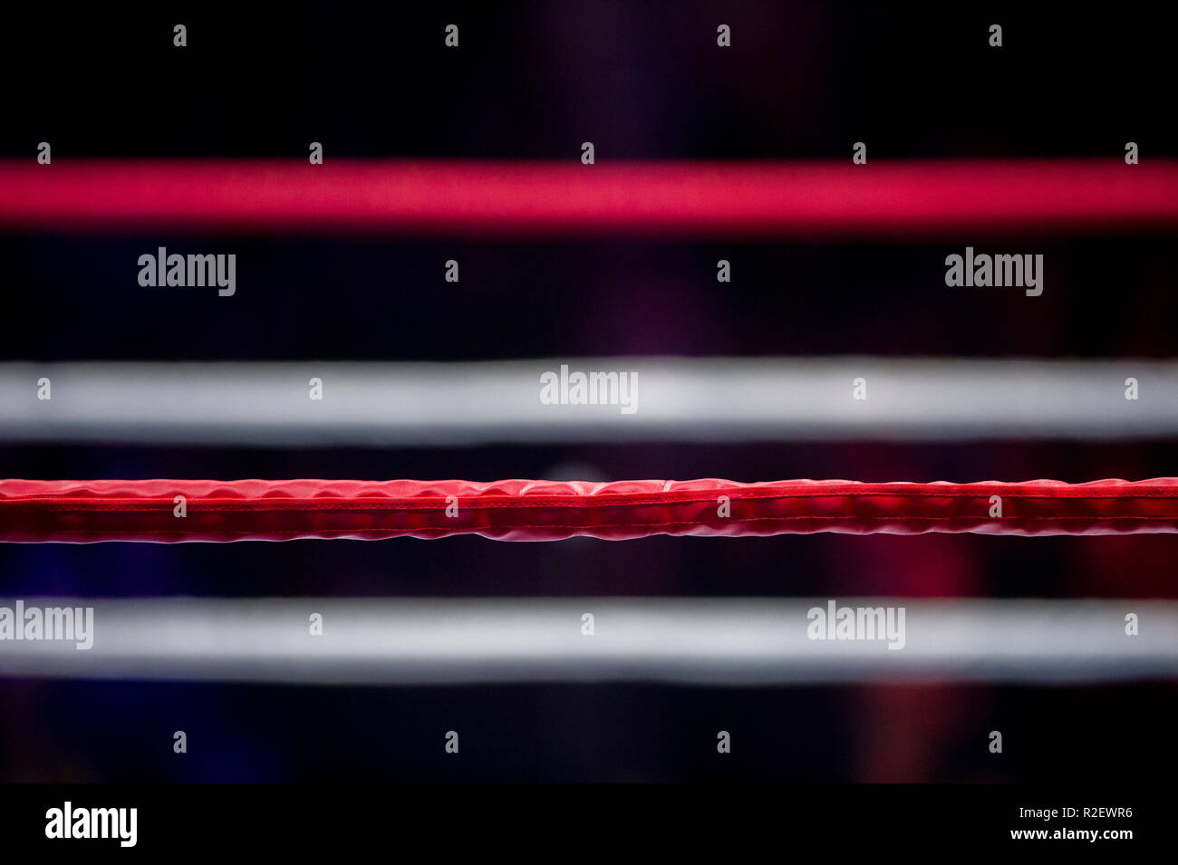 Boxing ring ropes with a blur spotlight Stock Photo - Alamy