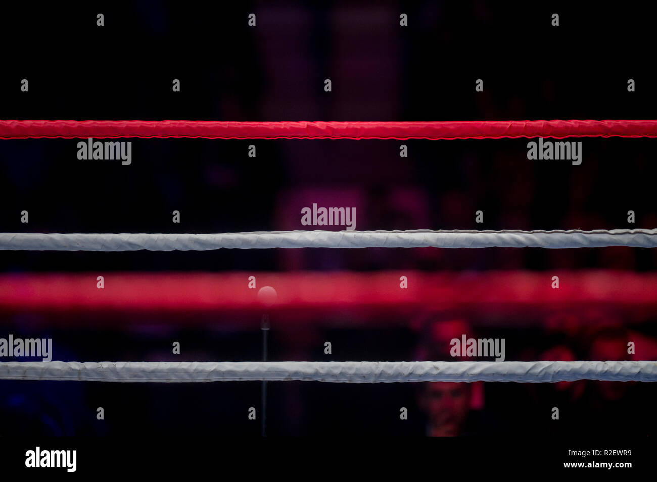 Boxing ring ropes with a blur spotlight Stock Photo - Alamy