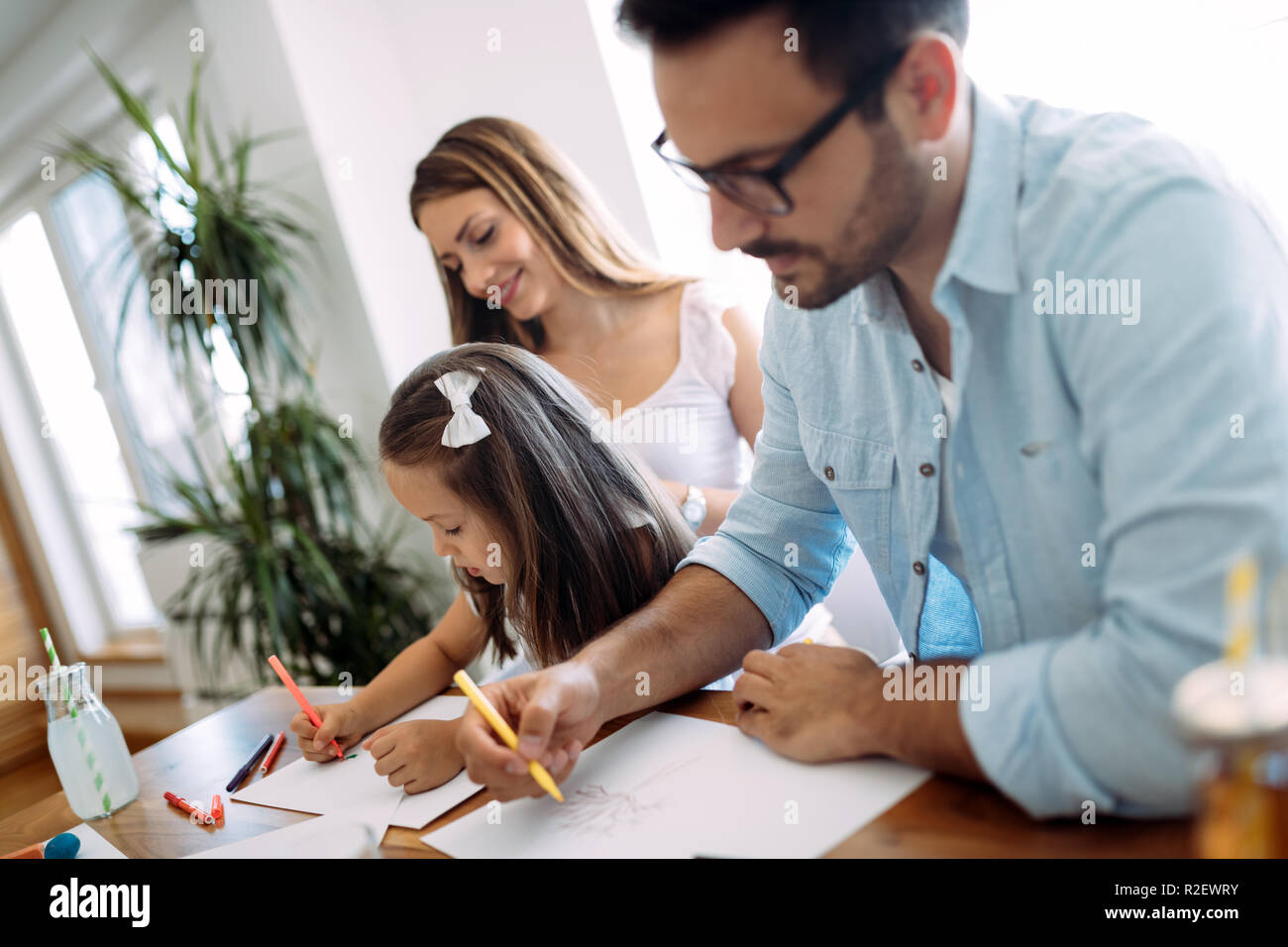Happy family having fun time at home Stock Photo - Alamy