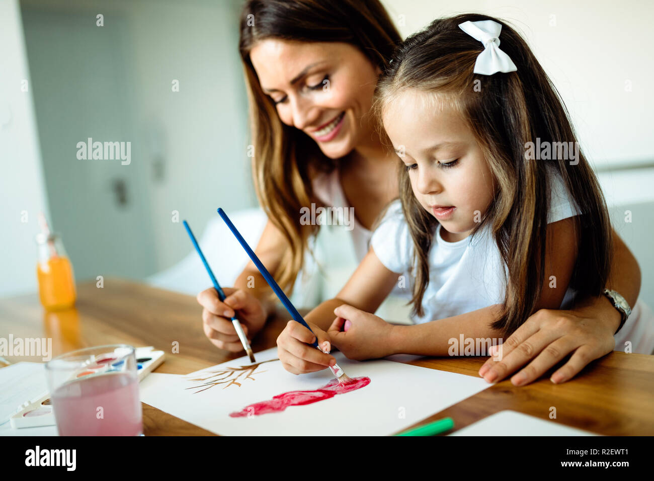 Happy family having fun time at home Stock Photo - Alamy