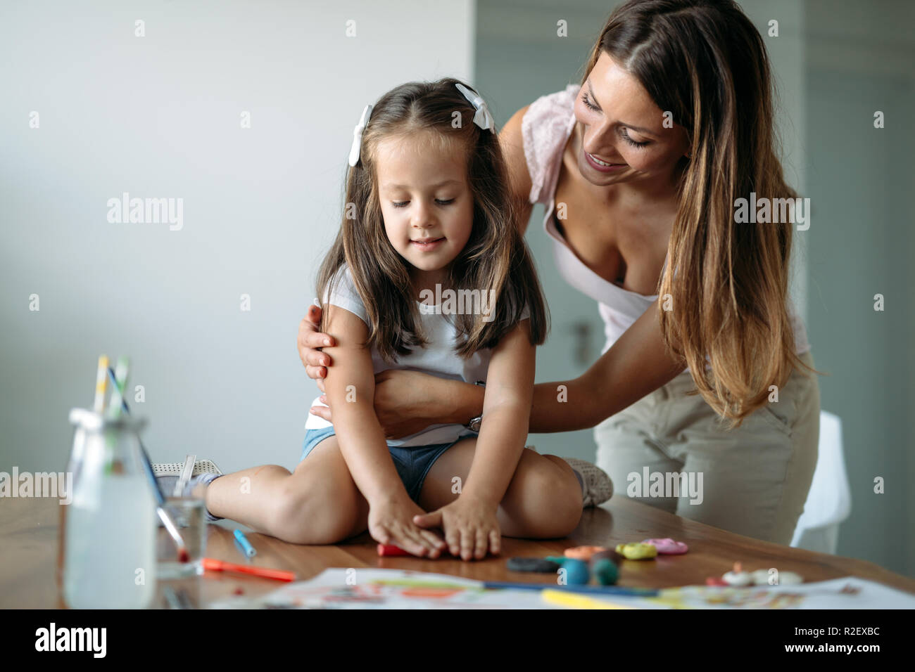 Happy family having fun time at home Stock Photo - Alamy