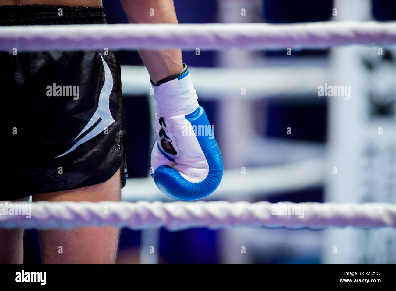 Muaythai boxer hand on the ring rope during the break Stock Photo - Alamy