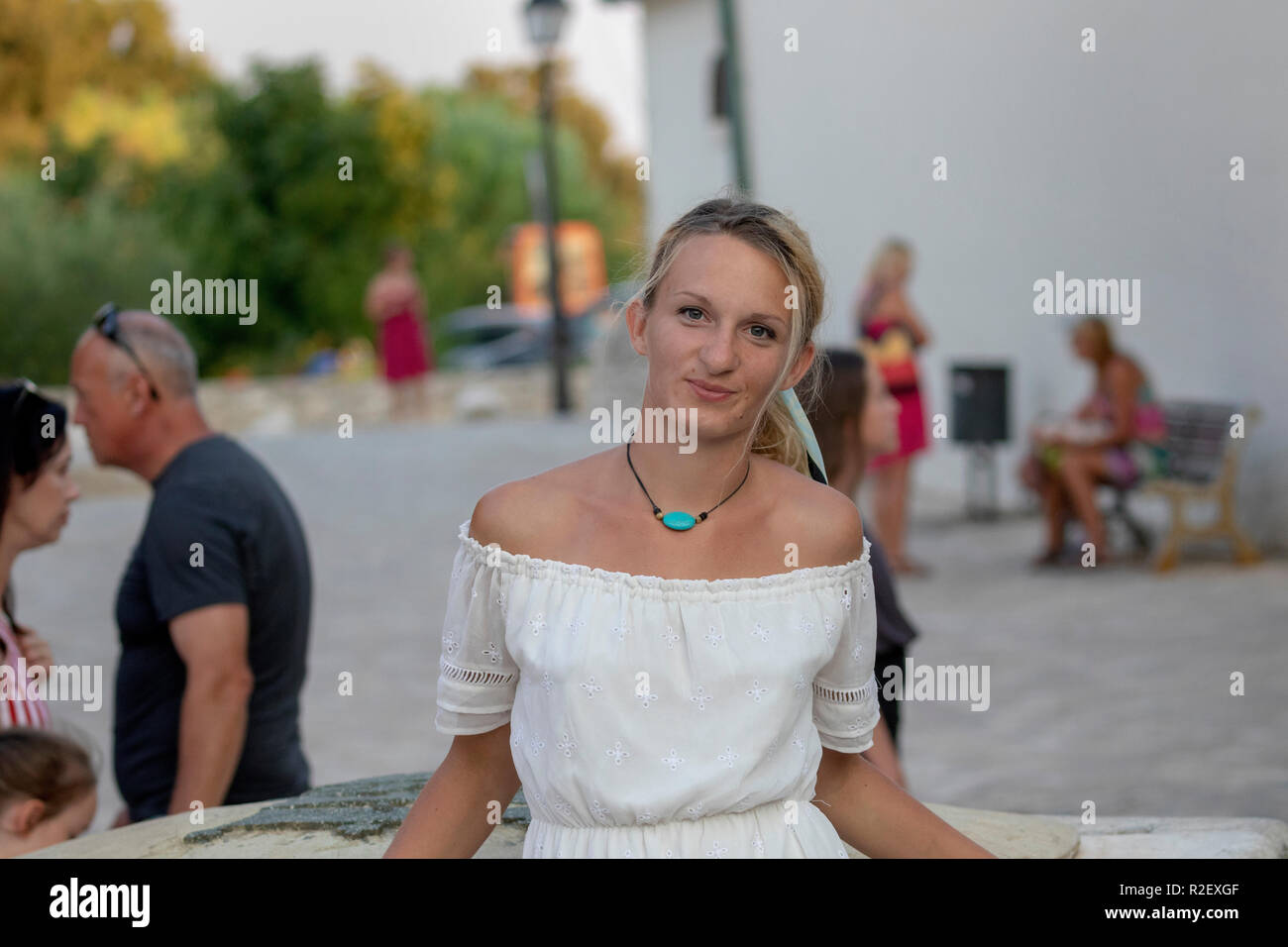 Girl in white dress in Nin, Croatia Stock Photo - Alamy
