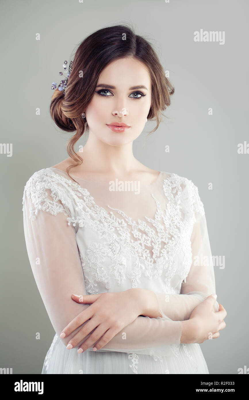 Romantic bride with makeup, bridal hairstyle and wedding dress Stock ...