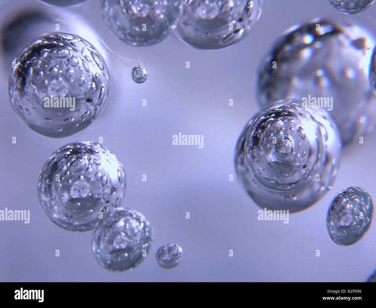 bubbles in glass enclosed v Stock Photo - Alamy