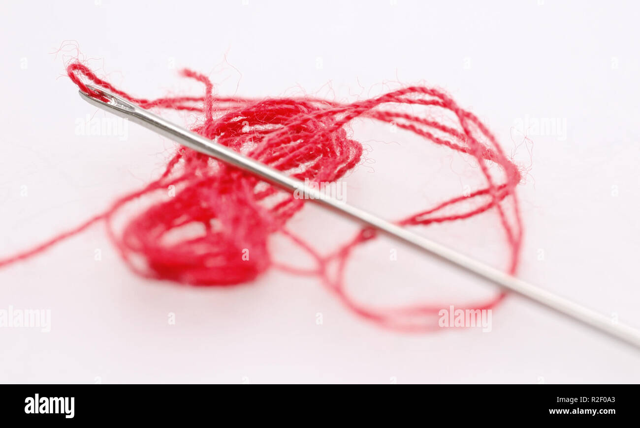 needle and thread Stock Photo - Alamy