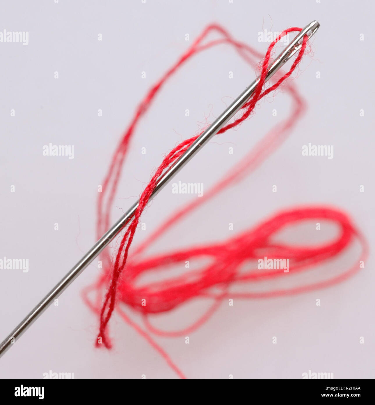 needle and thread Stock Photo - Alamy