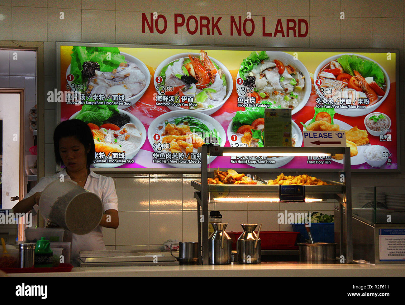 Traditional cooking singapore hi-res stock photography and images - Alamy