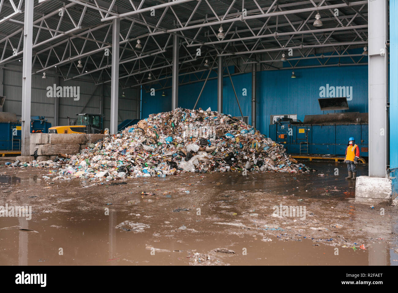 A pile of garbage in a waste storage area at a waste sorting plant ...