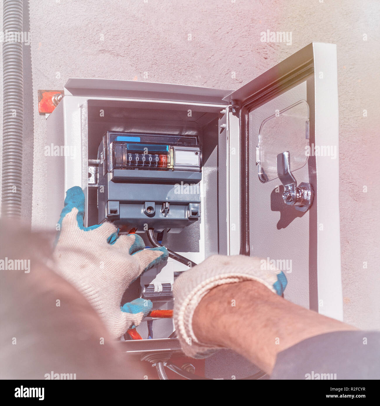 Replacing the old electricity meter with a new one. Repair of ...