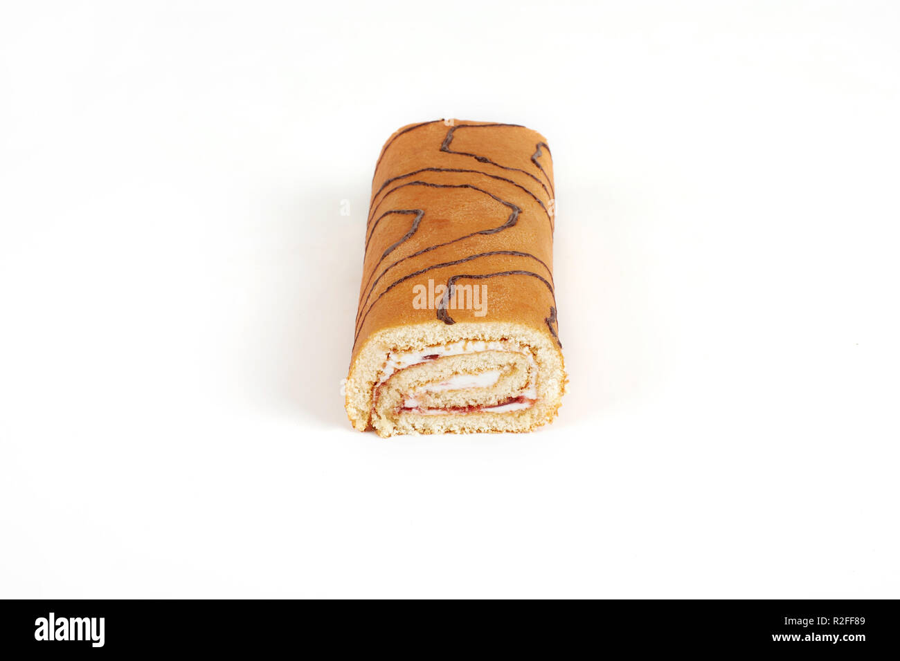 biscuit swiss roll isolated on white background Stock Photo - Alamy