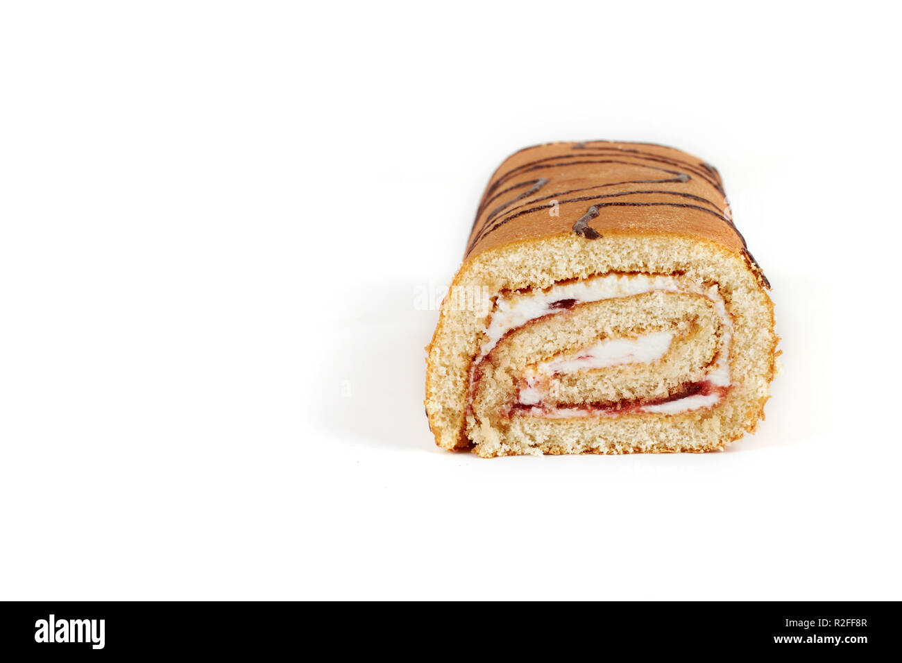 biscuit swiss roll isolated on white background Stock Photo - Alamy