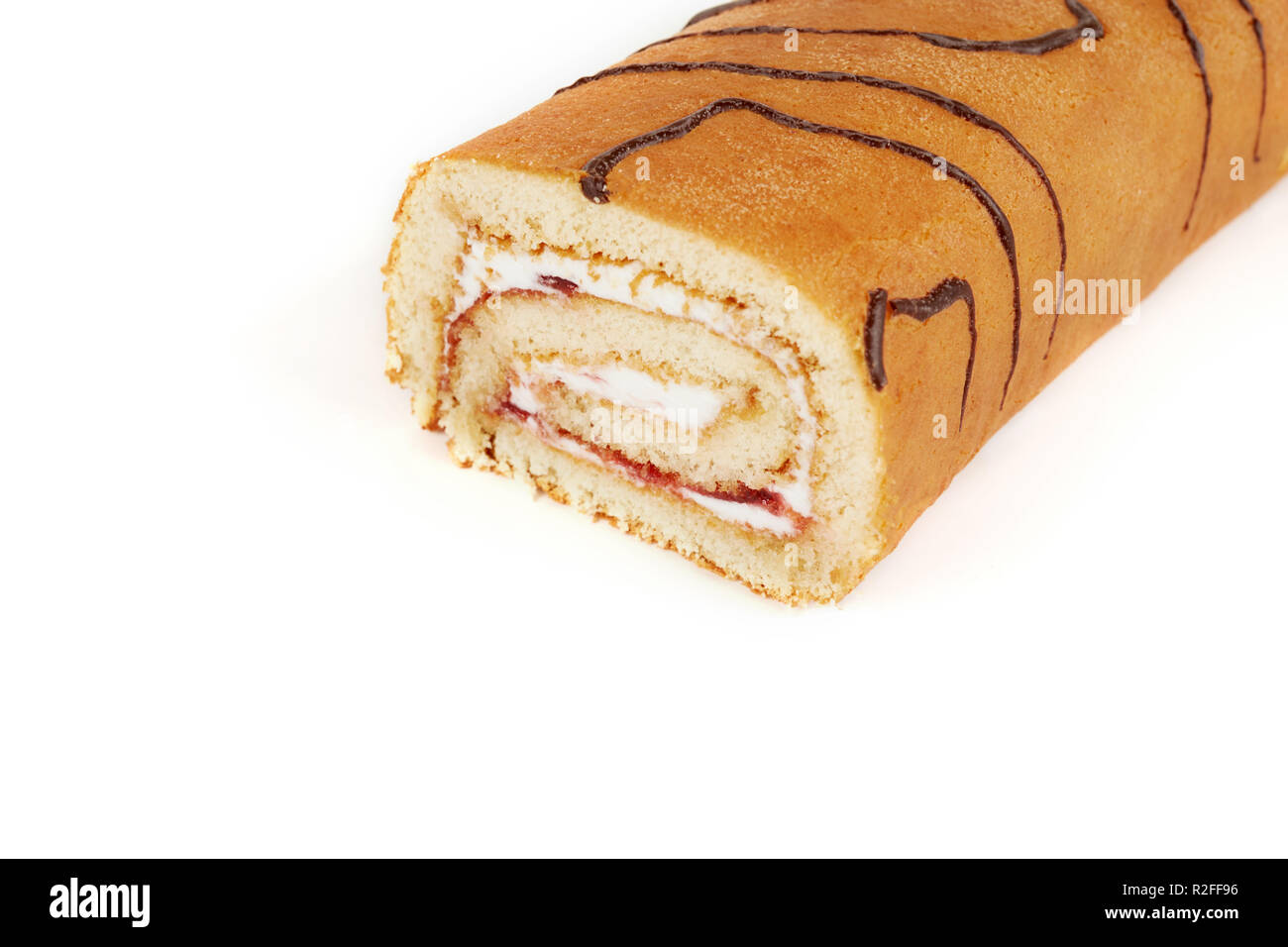 biscuit swiss roll isolated on white background Stock Photo - Alamy