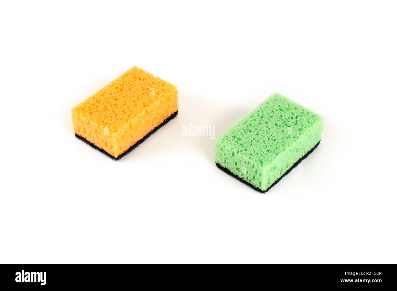 sponge for washing dishes, isolated on white background Stock Photo - Alamy