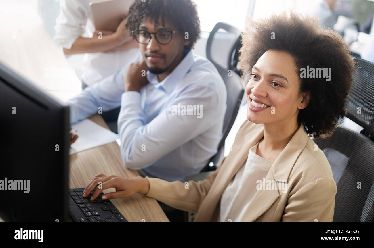 Programmer working in a software developing company office Stock Photo - Alamy