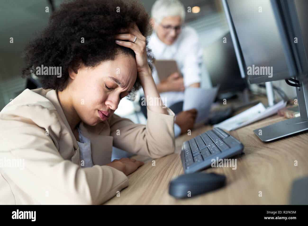 Portrait of an exhausted business woman sleeping at work Stock Photo ...