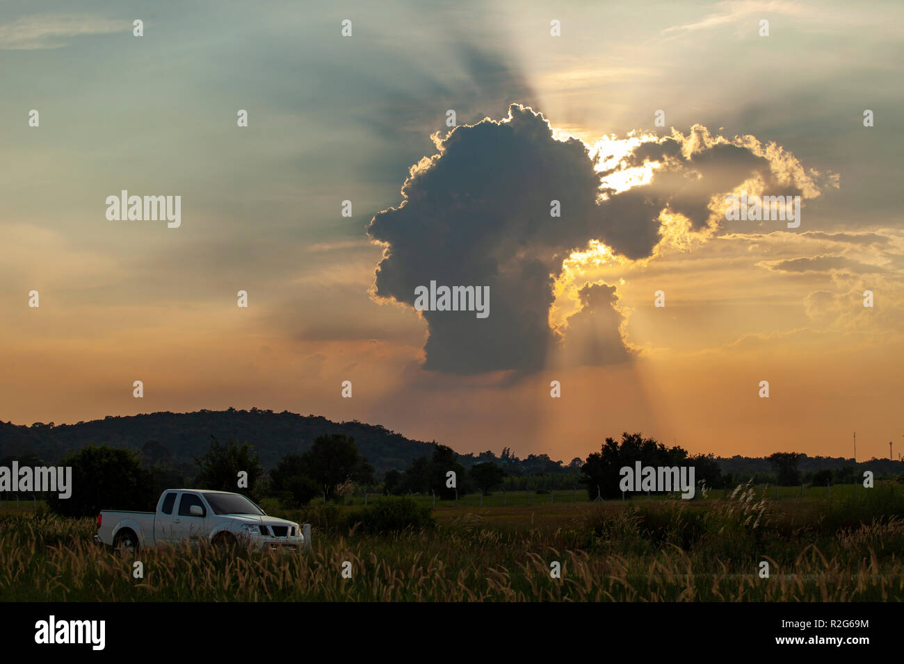 amazing human head shape cloud and sun light ray in saraburi thailand ...