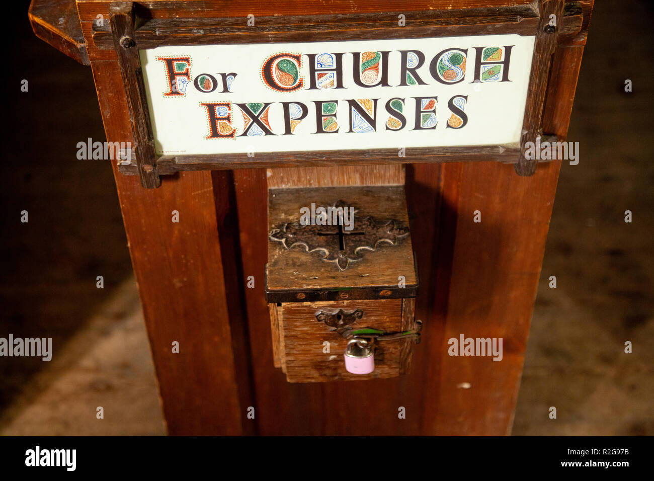 Locked collection box church hi-res stock photography and images - Alamy