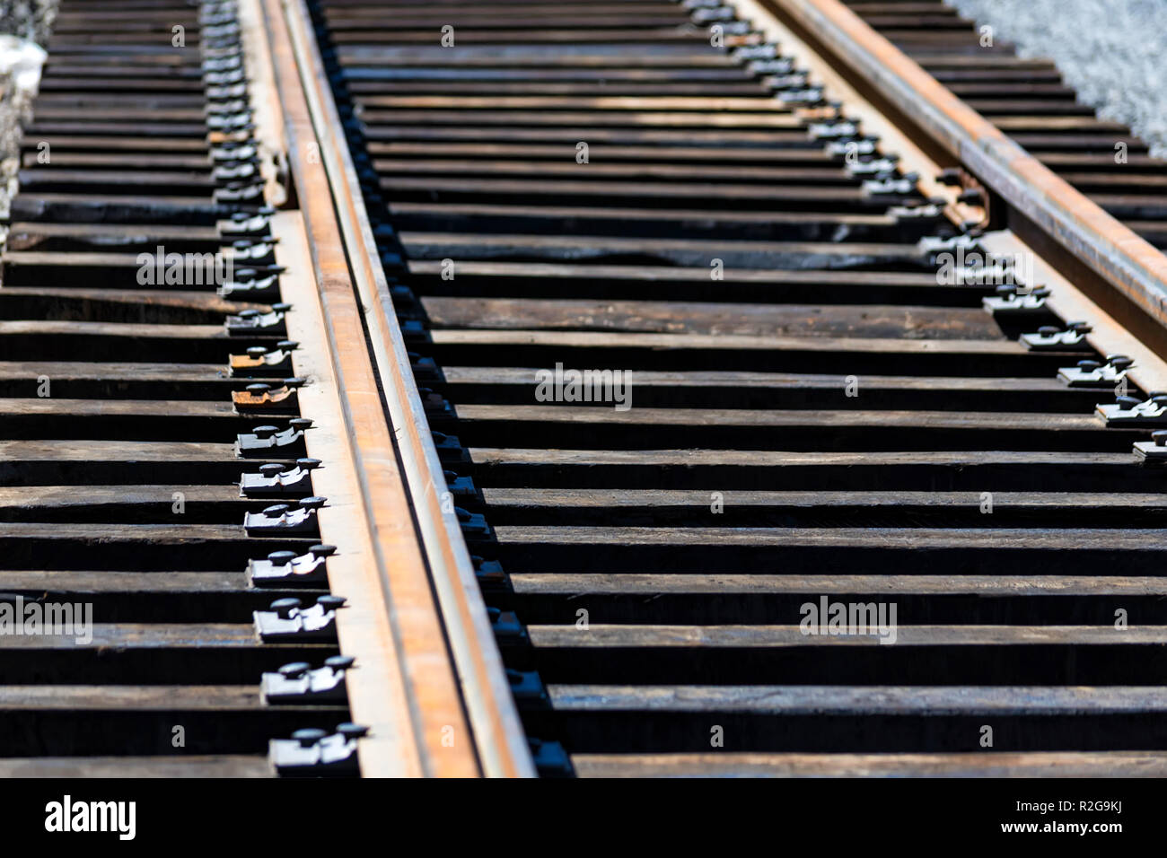 Close up image of new railway track Stock Photo - Alamy