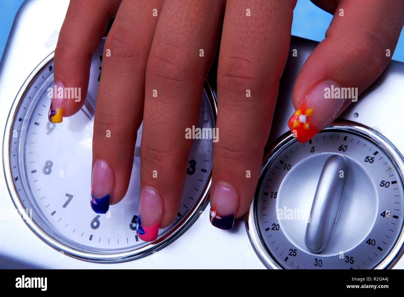 nail o clock Stock Photo - Alamy