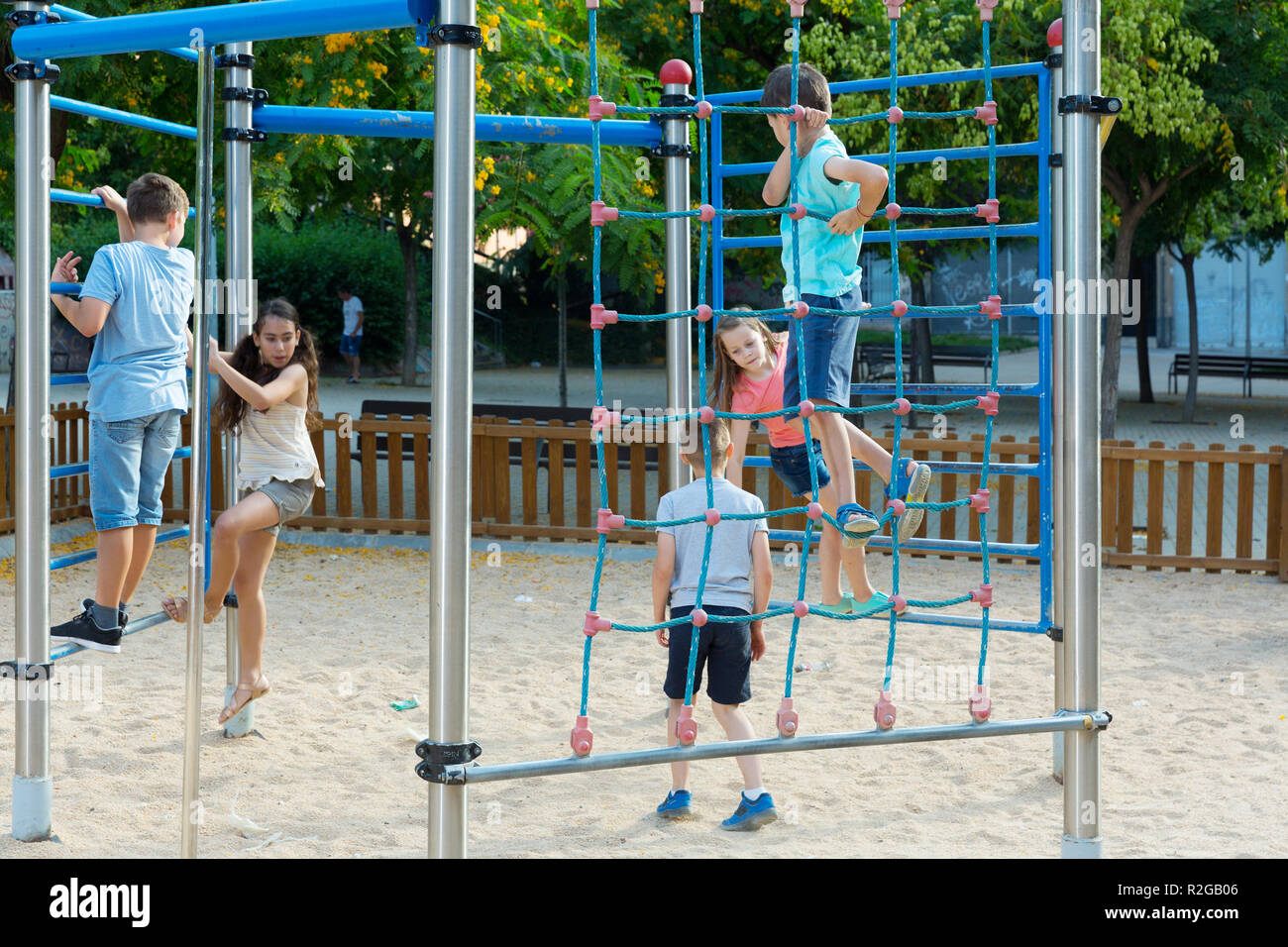 Glad smiling children playing at the playground together Stock Photo ...