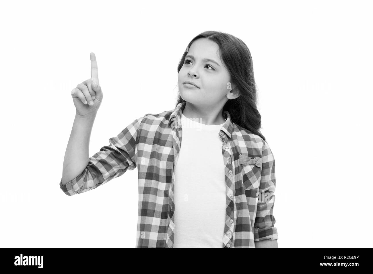 Wait a minute. Girl pointing upwards index finger. Child warning or ...