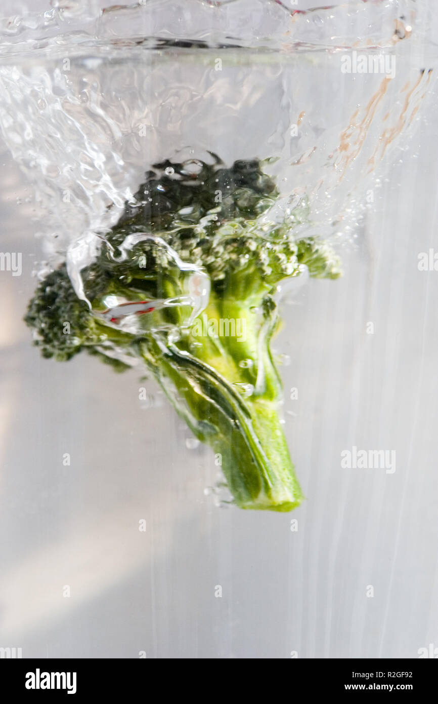 broccoli falling in water Stock Photo - Alamy