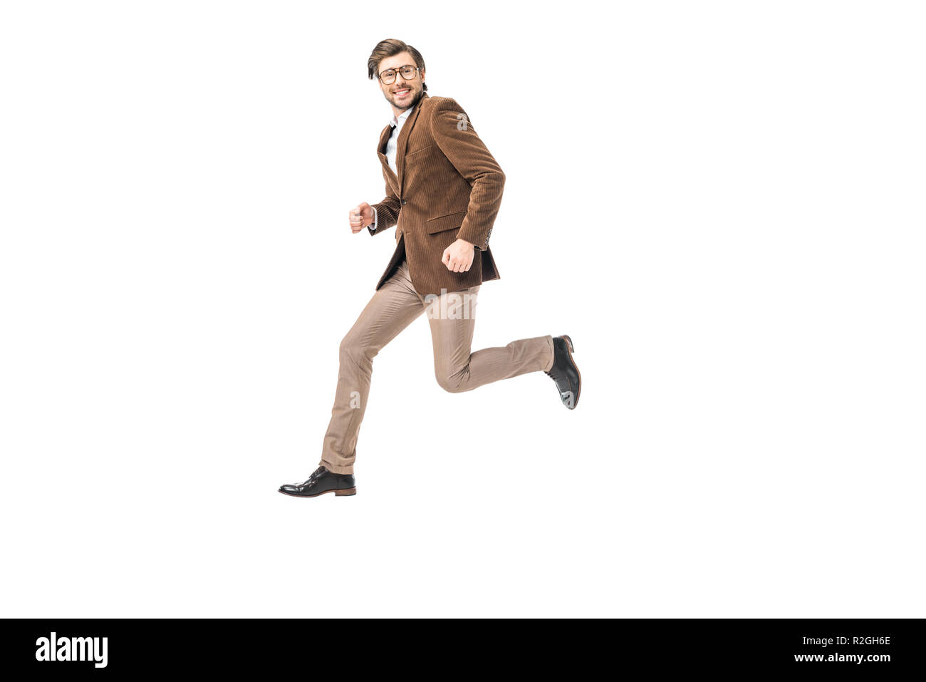 Positive young man jumping hi-res stock photography and images - Alamy