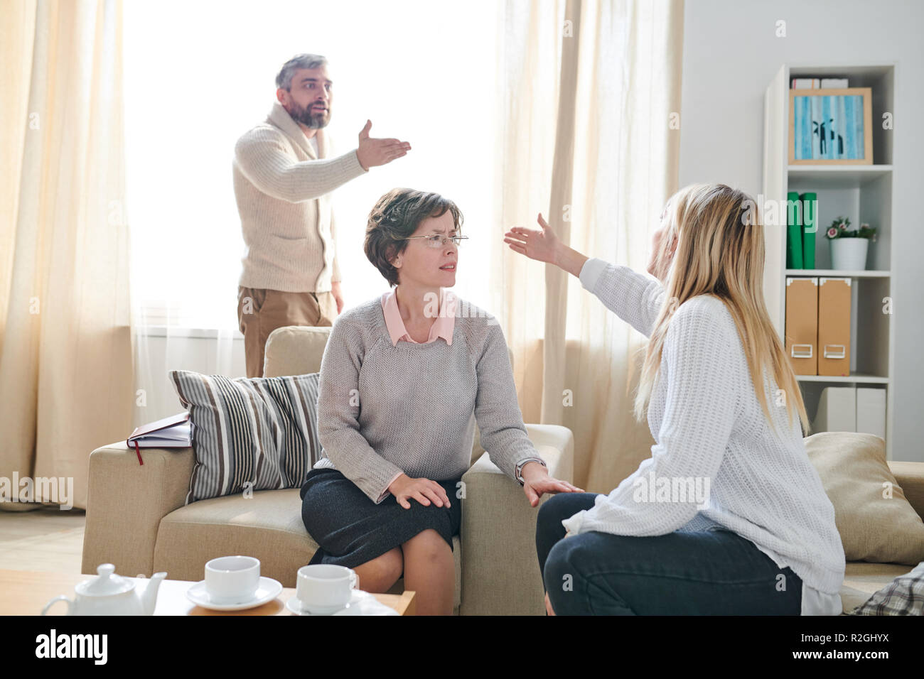 Young family couple offended hi-res stock photography and images - Alamy