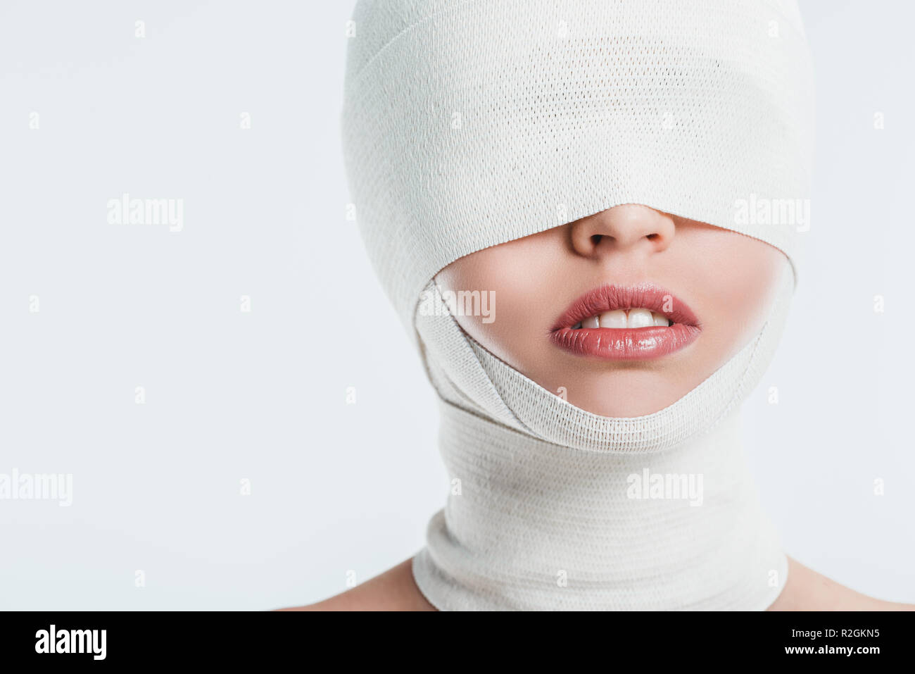 close up of woman face with white bandages isolated on white Stock ...