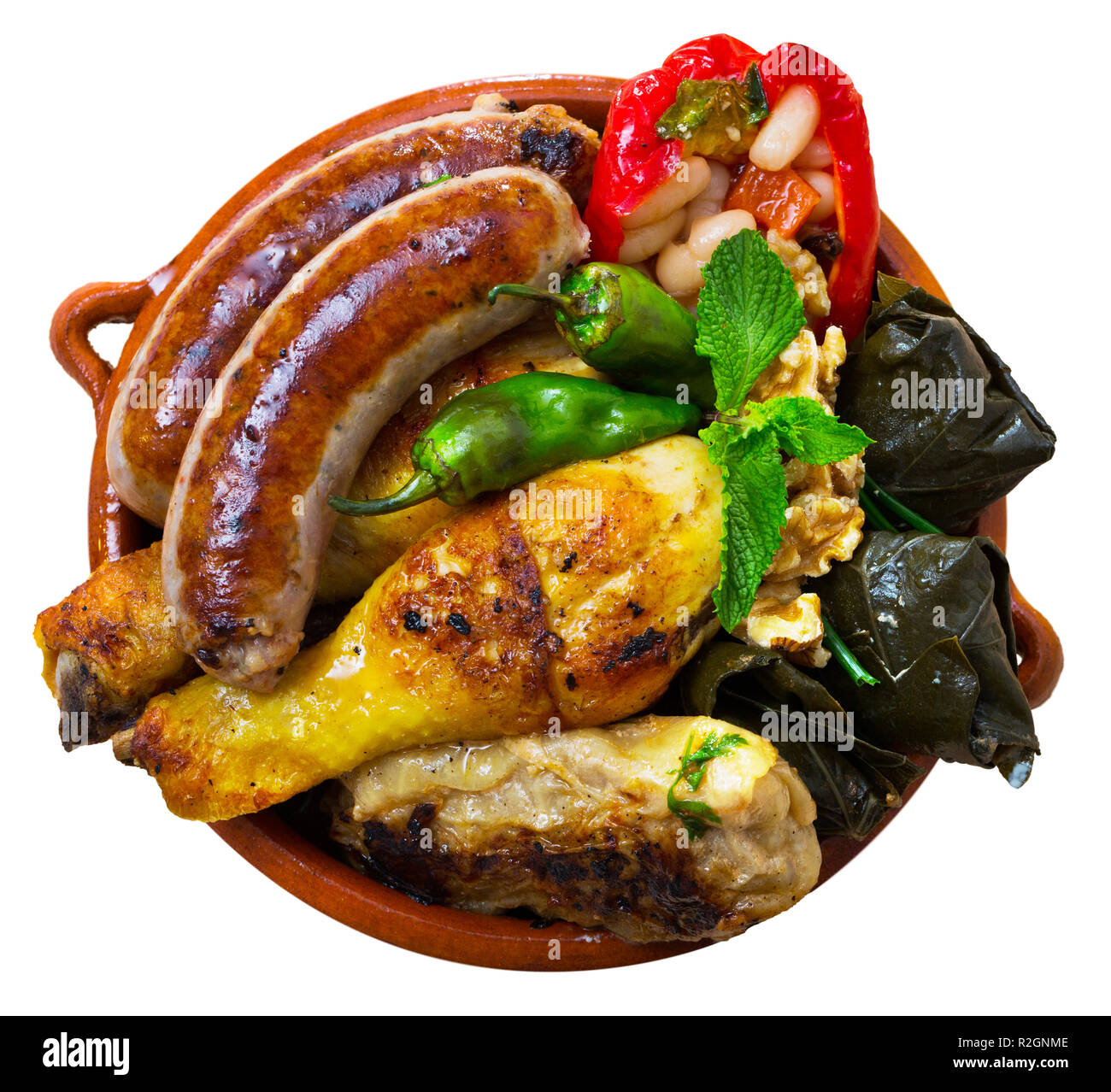 Top view of Bulgarian dish Kapama from mixed stewed meat and sausages ...
